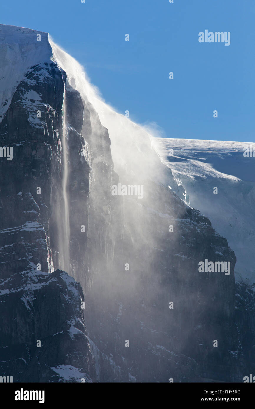 Snow blowing over cornices at Mount Kitchener, Jasper National Park ...