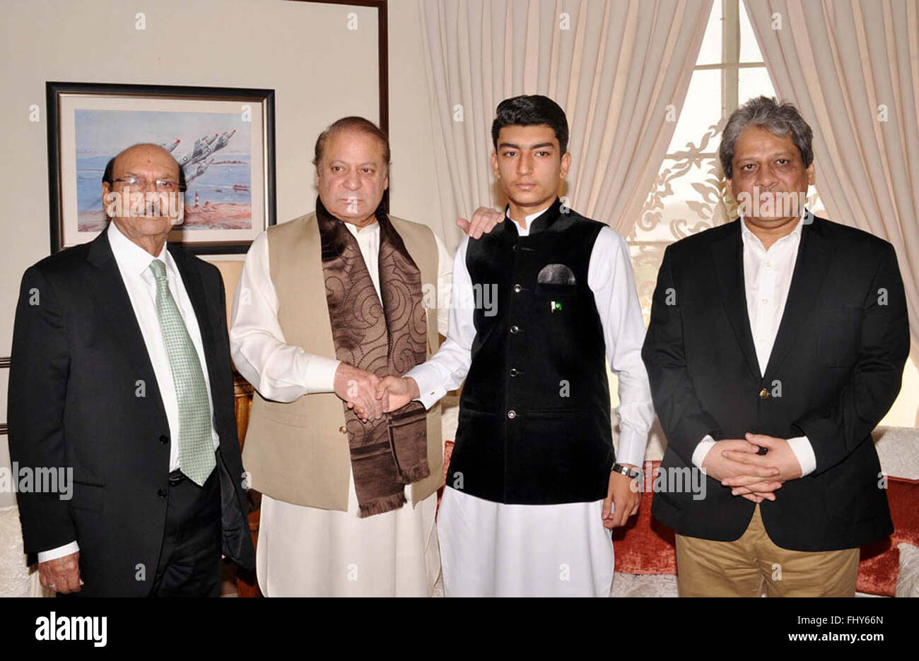 Prime Minister Muhammad Nawaz Sharif pictured with Anwar Ullah Khan, an ...