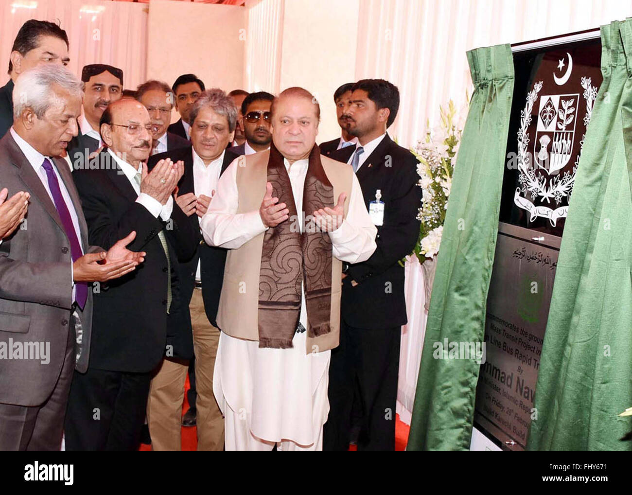 Prime Minister Muhammad Nawaz Sharif offering prays after ground breaking ceremony of Green Line ...