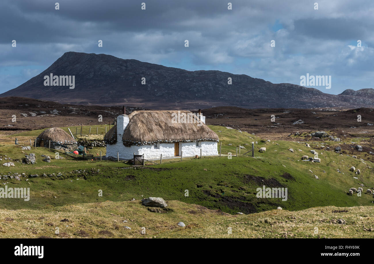 Traditional Hebridean White House and Eaval North Uist Stock Photo - Alamy