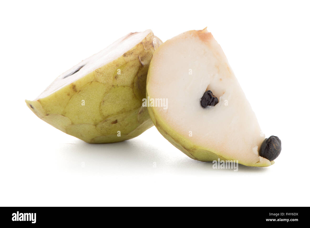 Custard apple, also known as Bullocks or Bulls Heart on white ...