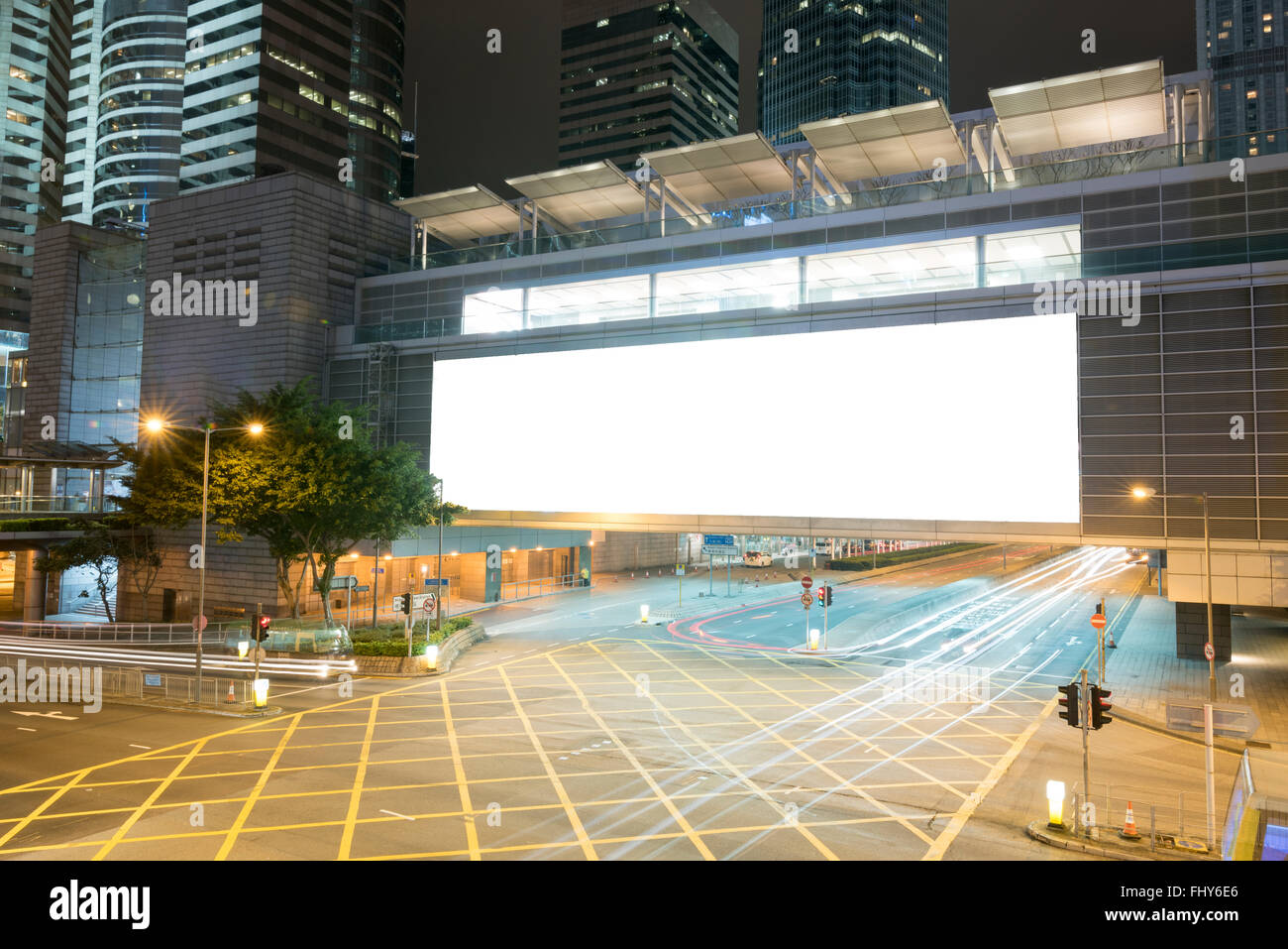 Big Empty Billboard at night in city with busy traffic Stock Photo - Alamy