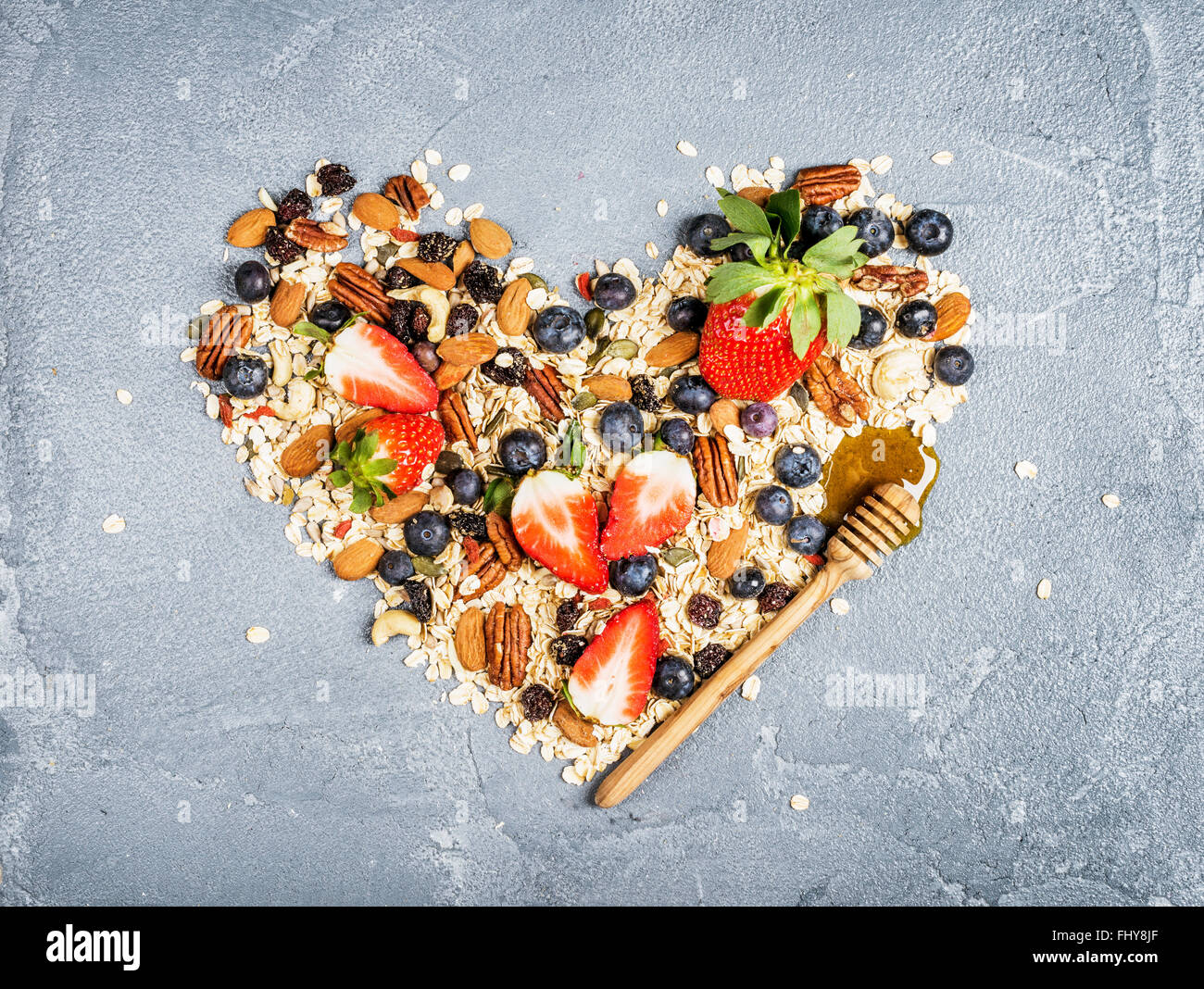Ingredients for cooking healthy breakfast muesli in shape of heart ...