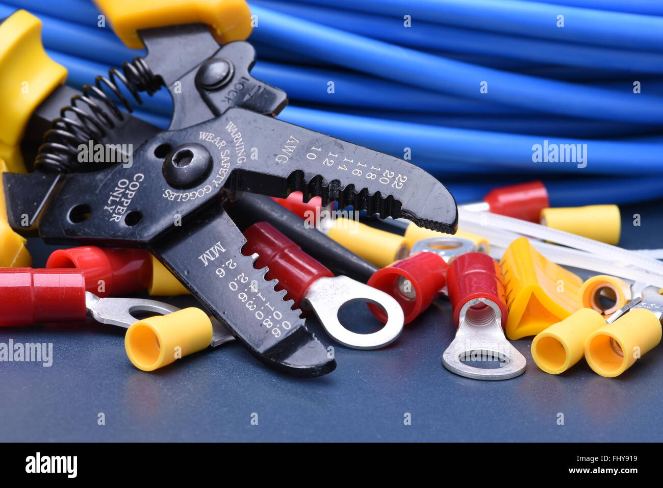 Tools for electrician and cables on metal surface Stock Photo - Alamy