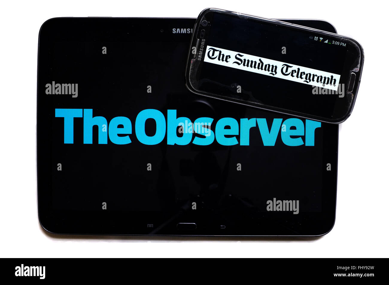 The logos of The Observer and The Sunday Telegraph newspapers displayed ...