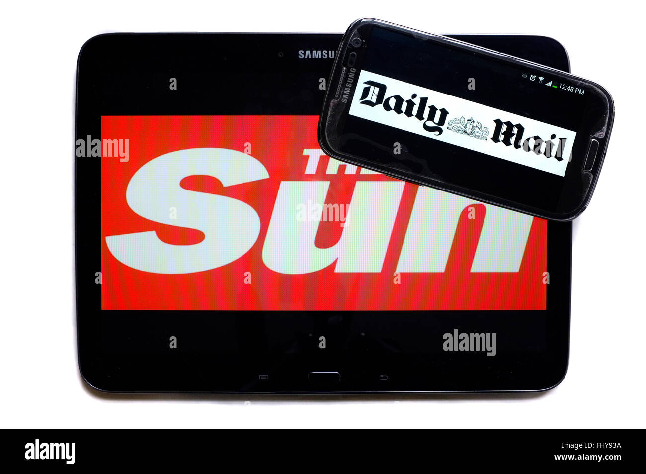 The logos of The Sun and the Daily Mail newspapers displayed on the ...