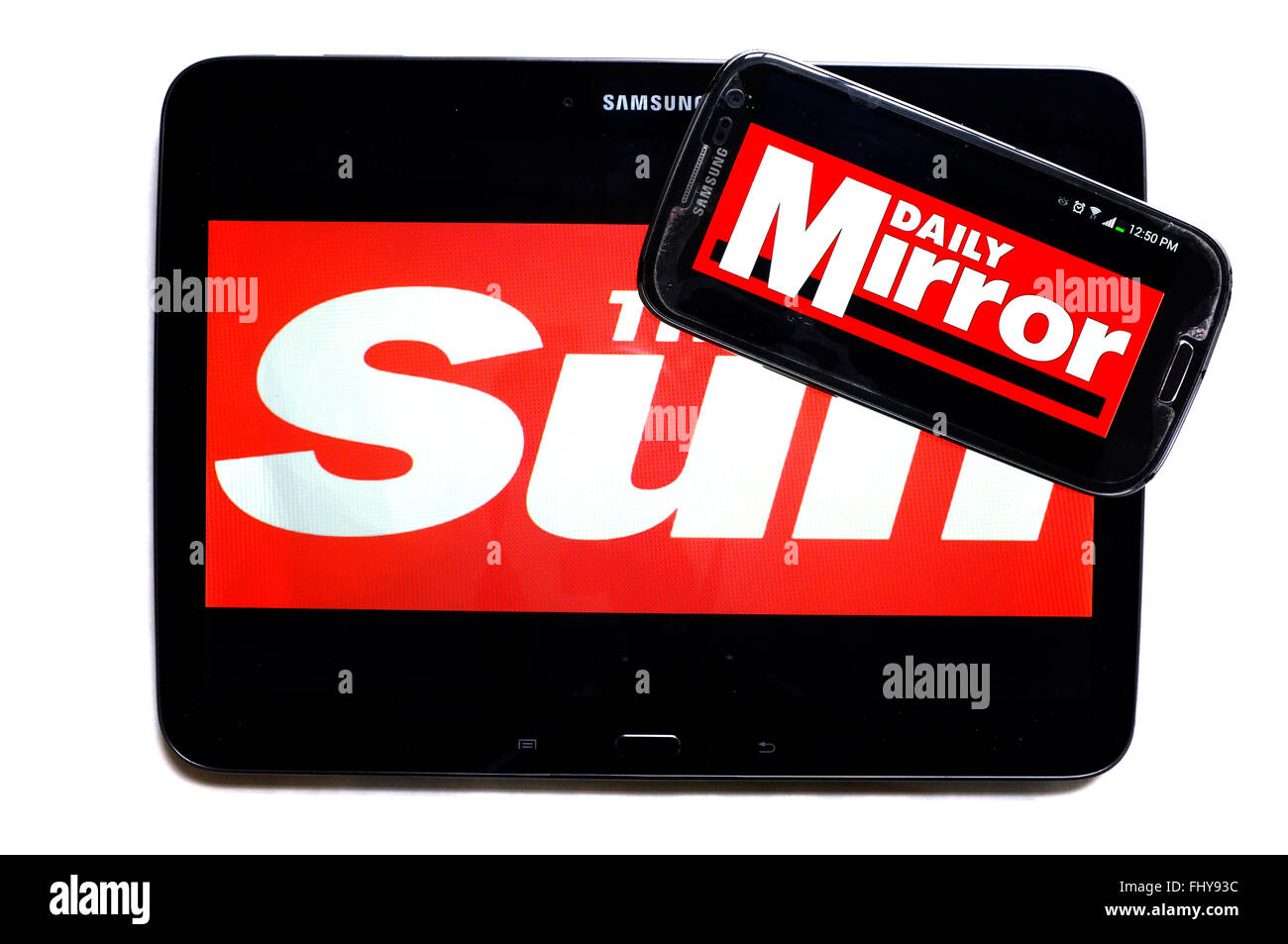 The logos of The Sun and the Daily Mirror newspapers displayed on the ...