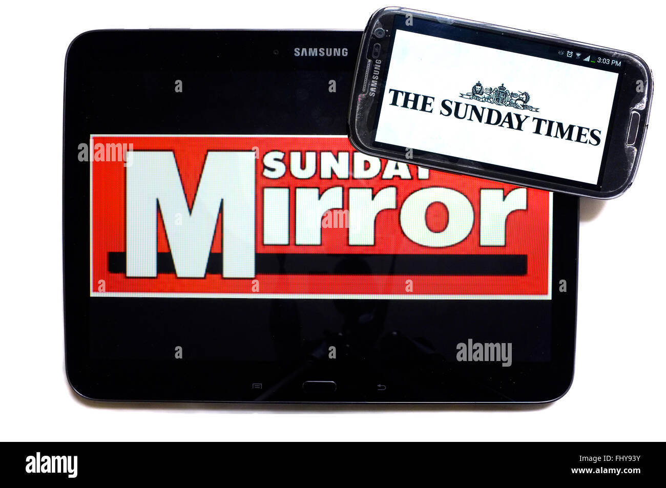 The logos of the Sunday Mirror and Sunday Times newspapers displayed on ...
