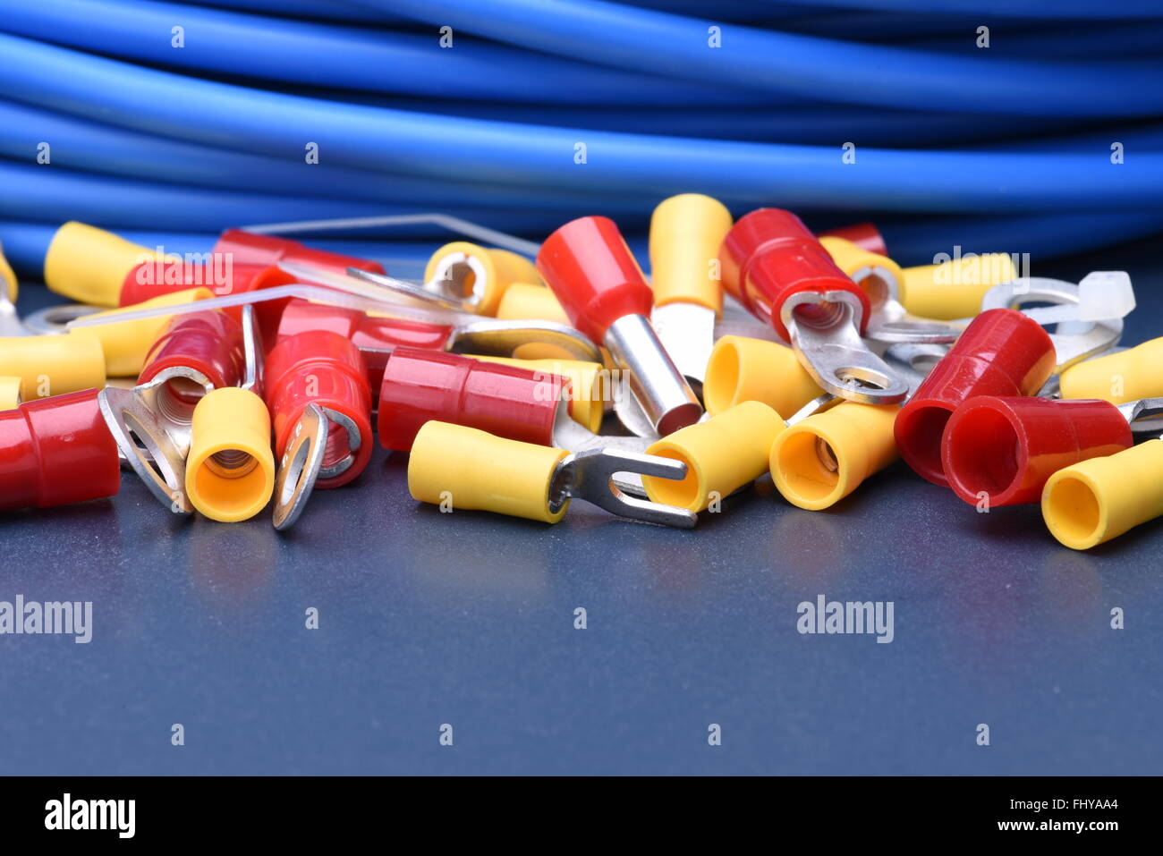 Terminal electrical accessories and cable on metal surface Stock Photo ...