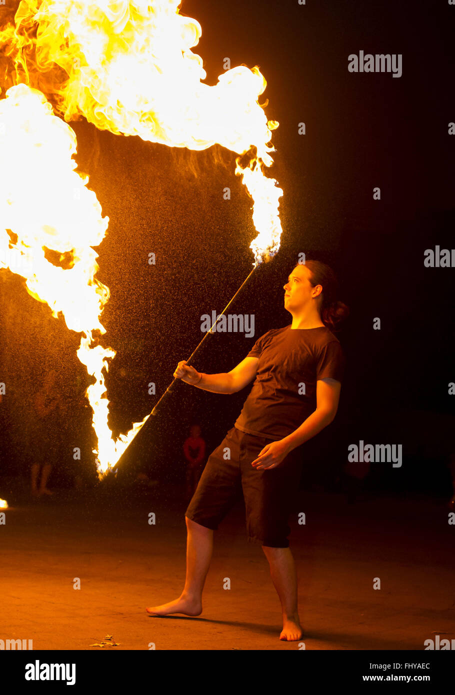 Fire twirlers hi-res stock photography and images - Alamy