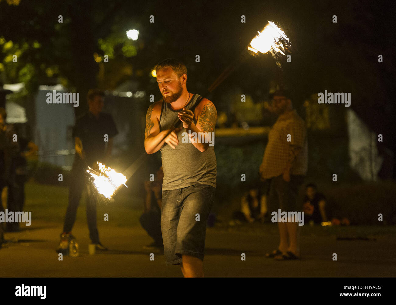 Fire twirlers hi-res stock photography and images - Alamy