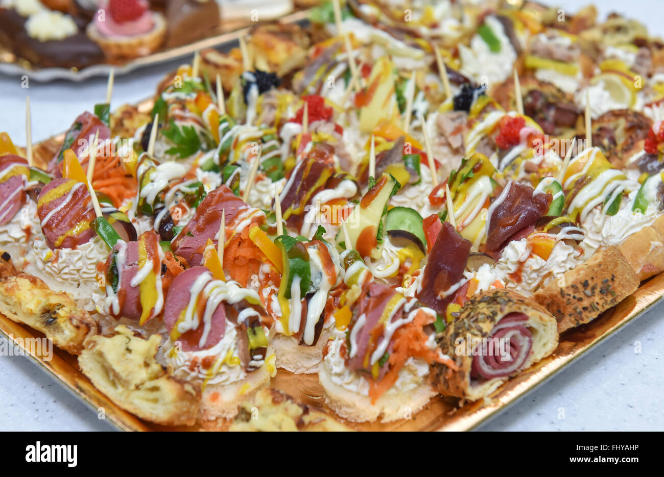 Selection of luxury petit four snack appetizers on tray Stock Photo - Alamy