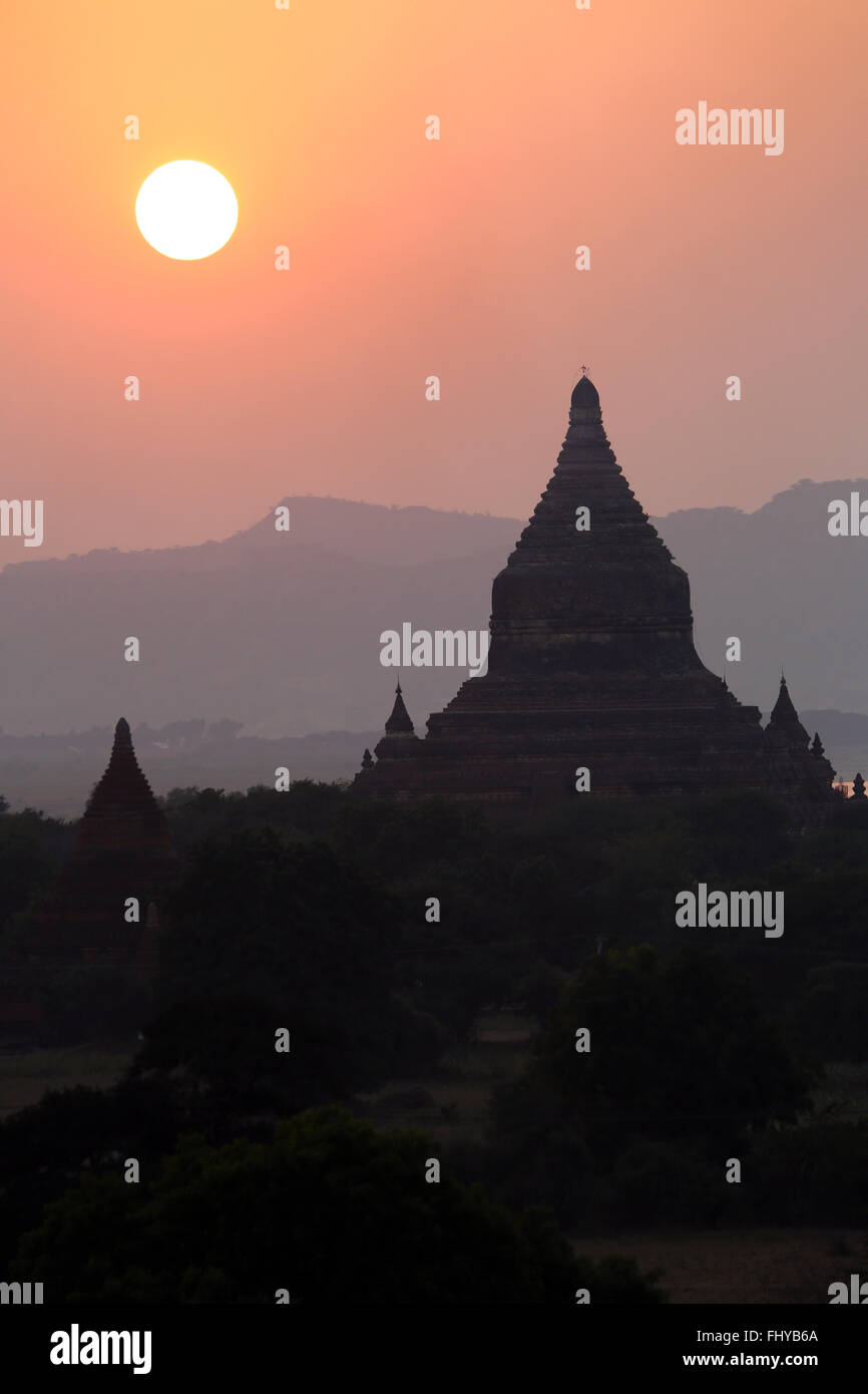 Temples and pagodas at sunset on the Central Plain of Bagan, Myanmar ...