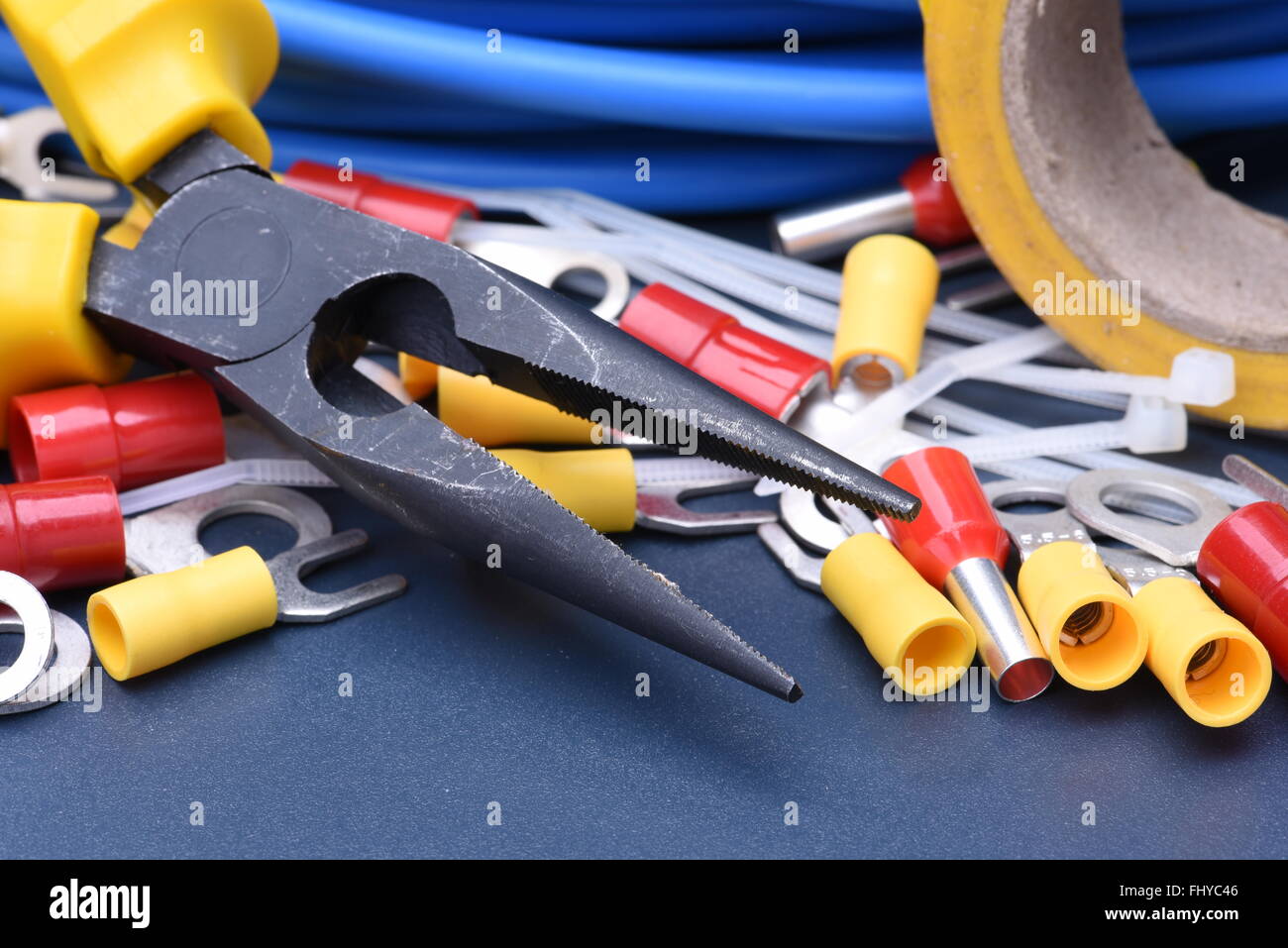 Tools for electrician and cables on metal surface Stock Photo - Alamy