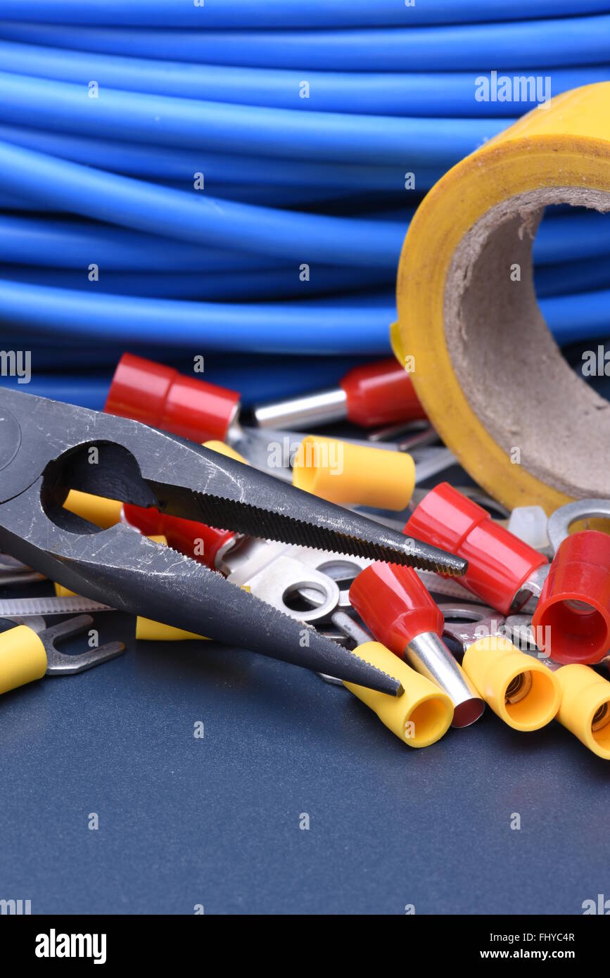 Tools for electrician and cables on metal surface Stock Photo - Alamy