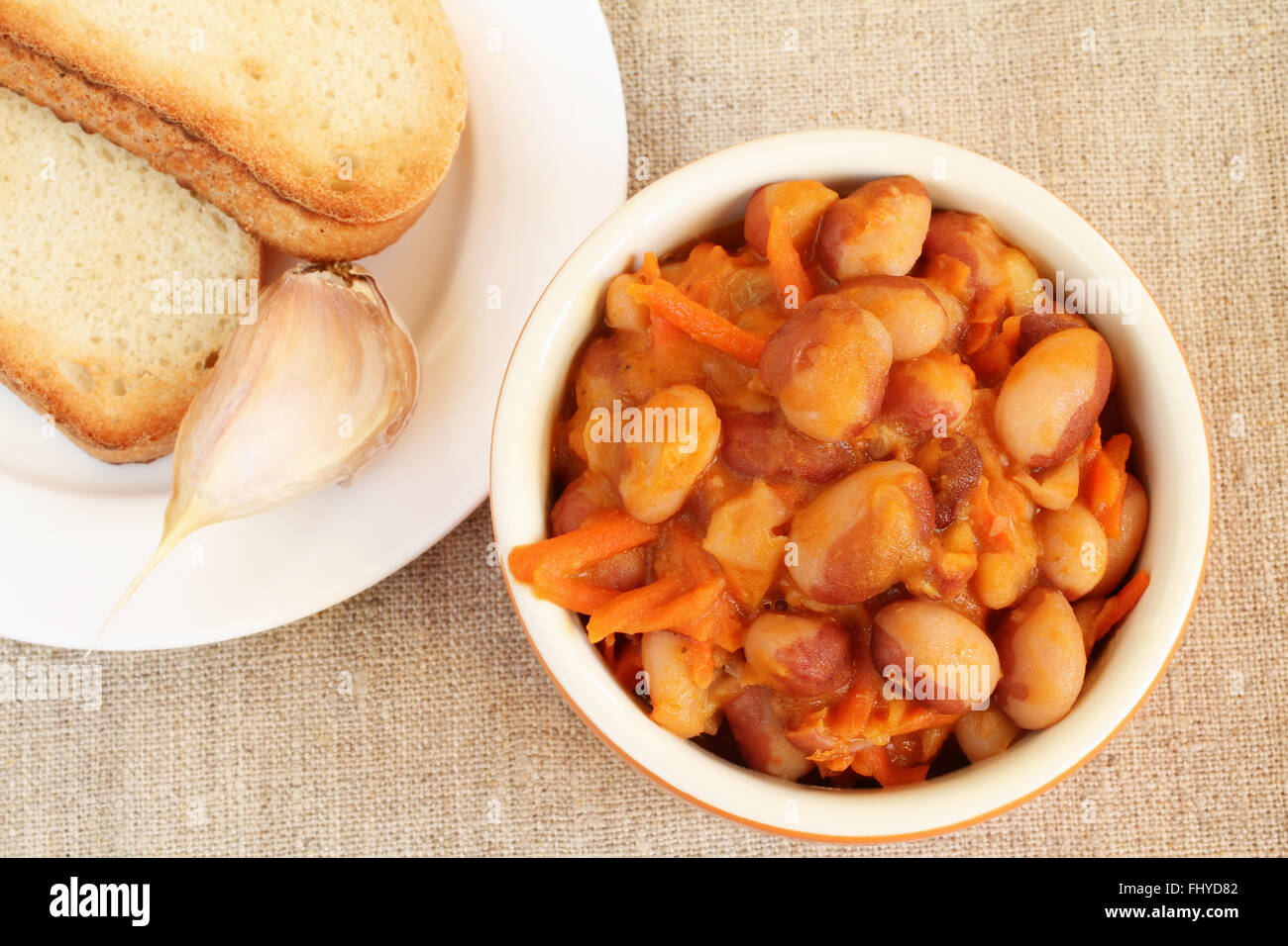 Kidney beans ragout with carrot, onion and tomato dressing in orange ...