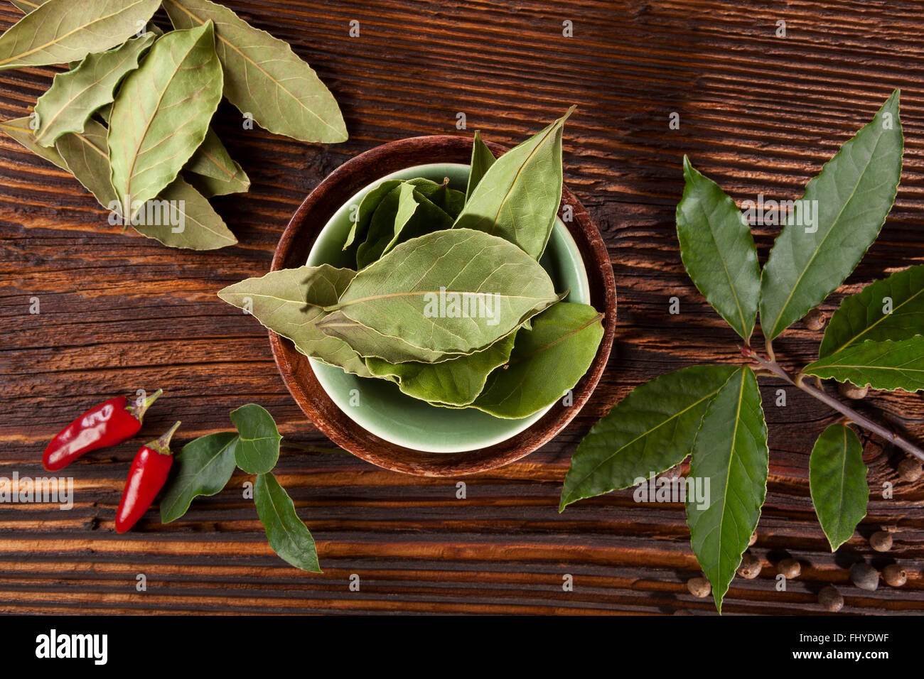 Bay leaves, traditional spice and condiment wooden background. Bay ...