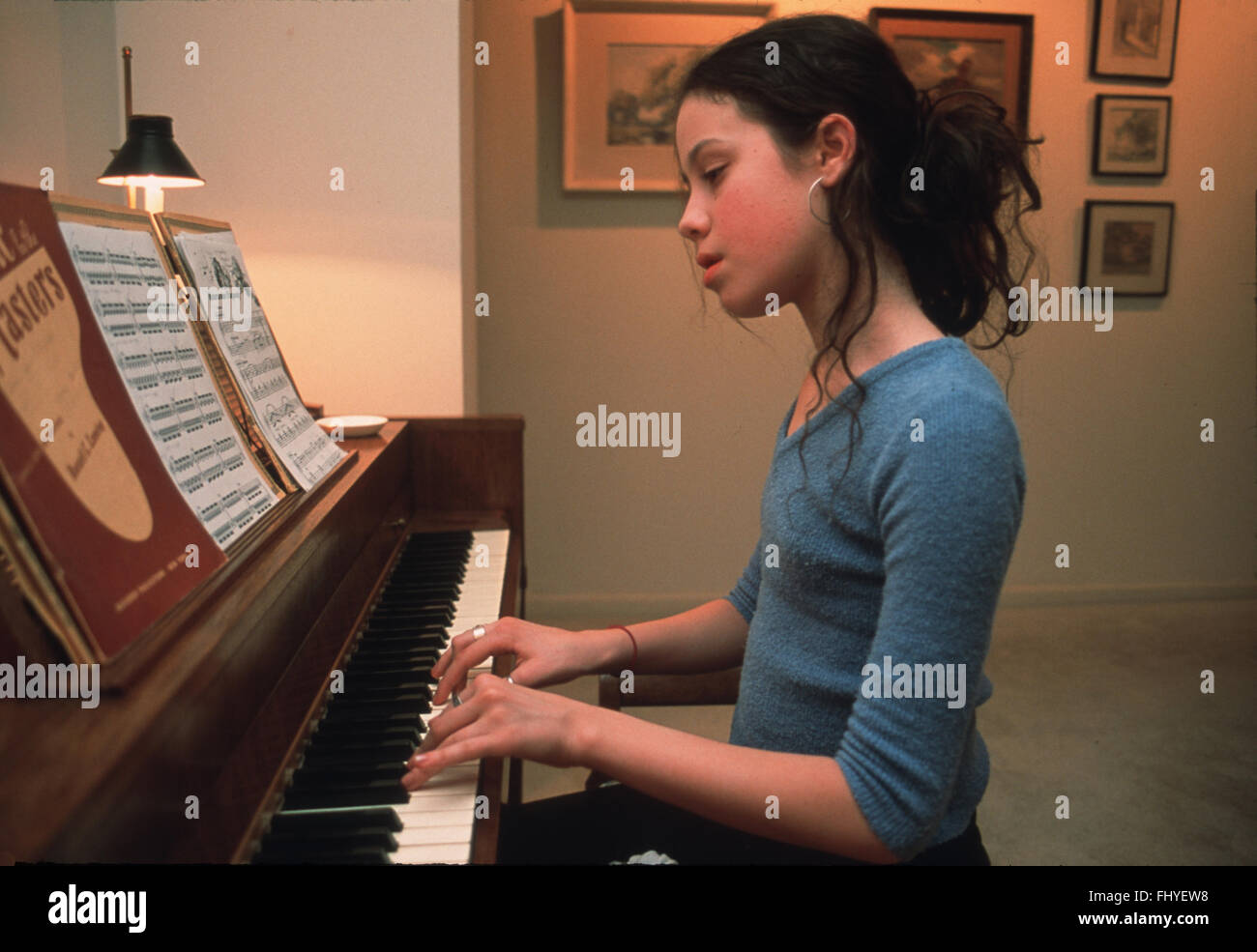 Upright piano girl hi-res stock photography and images - Alamy