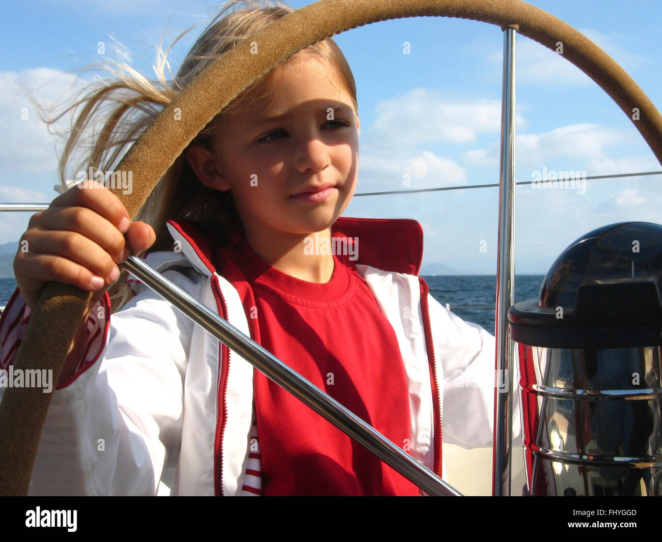 Norway, Stavanger, portrait of girl at helm Stock Photo - Alamy