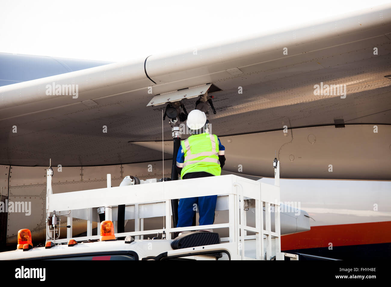 Man refuelling plane hi-res stock photography and images - Alamy