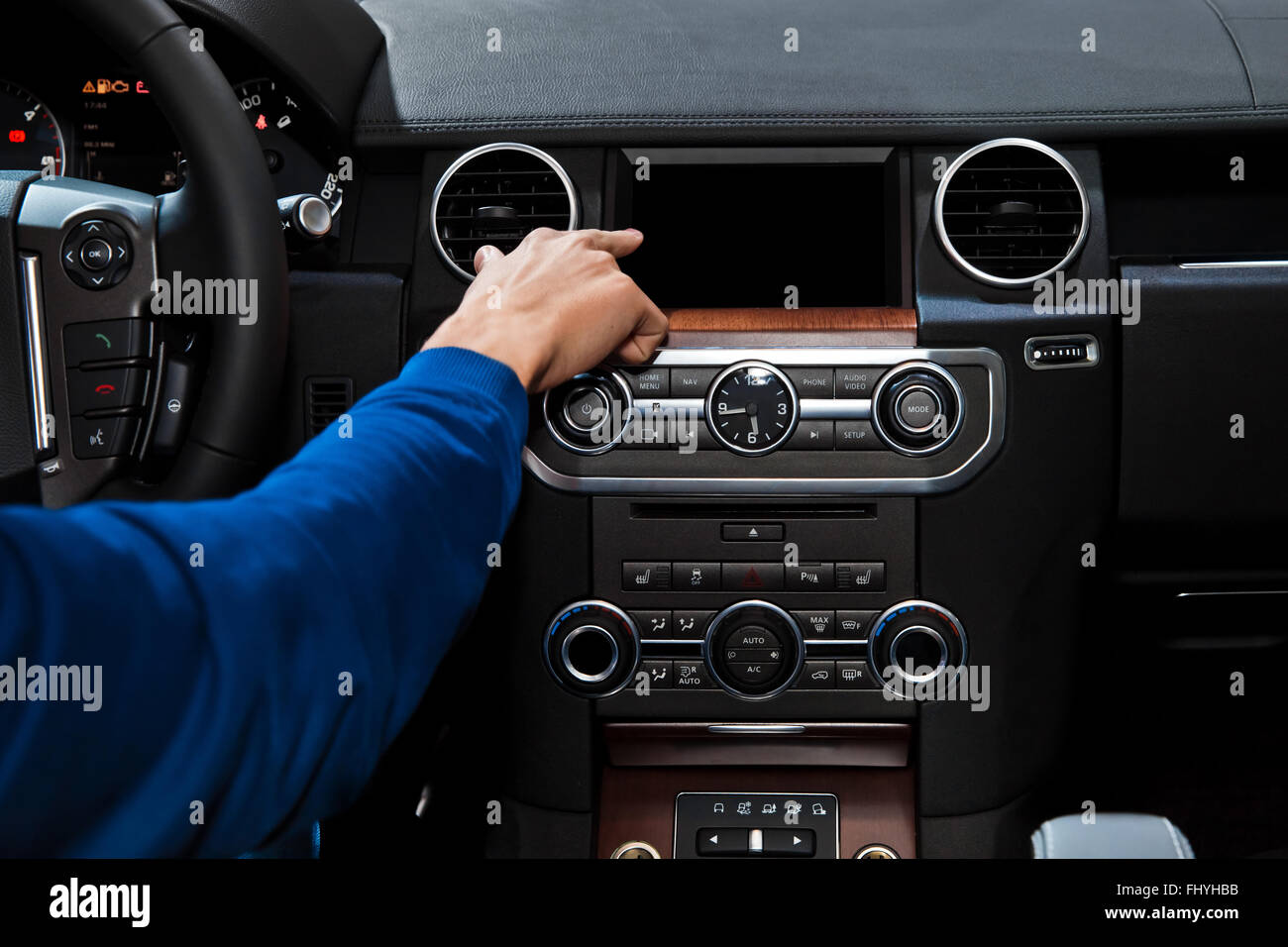 Hand using car buttons hi-res stock photography and images - Alamy