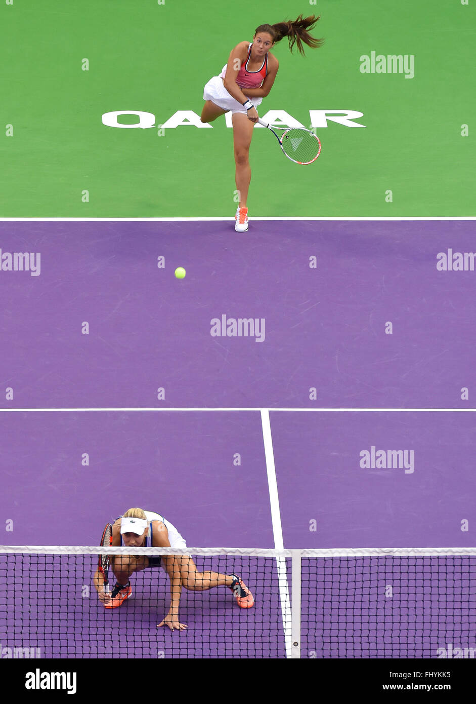 Doha, Qatar. 26th Feb, 2016. Daria Kasatkina (Top) and Elena Vesnina of Russia serve during the ...
