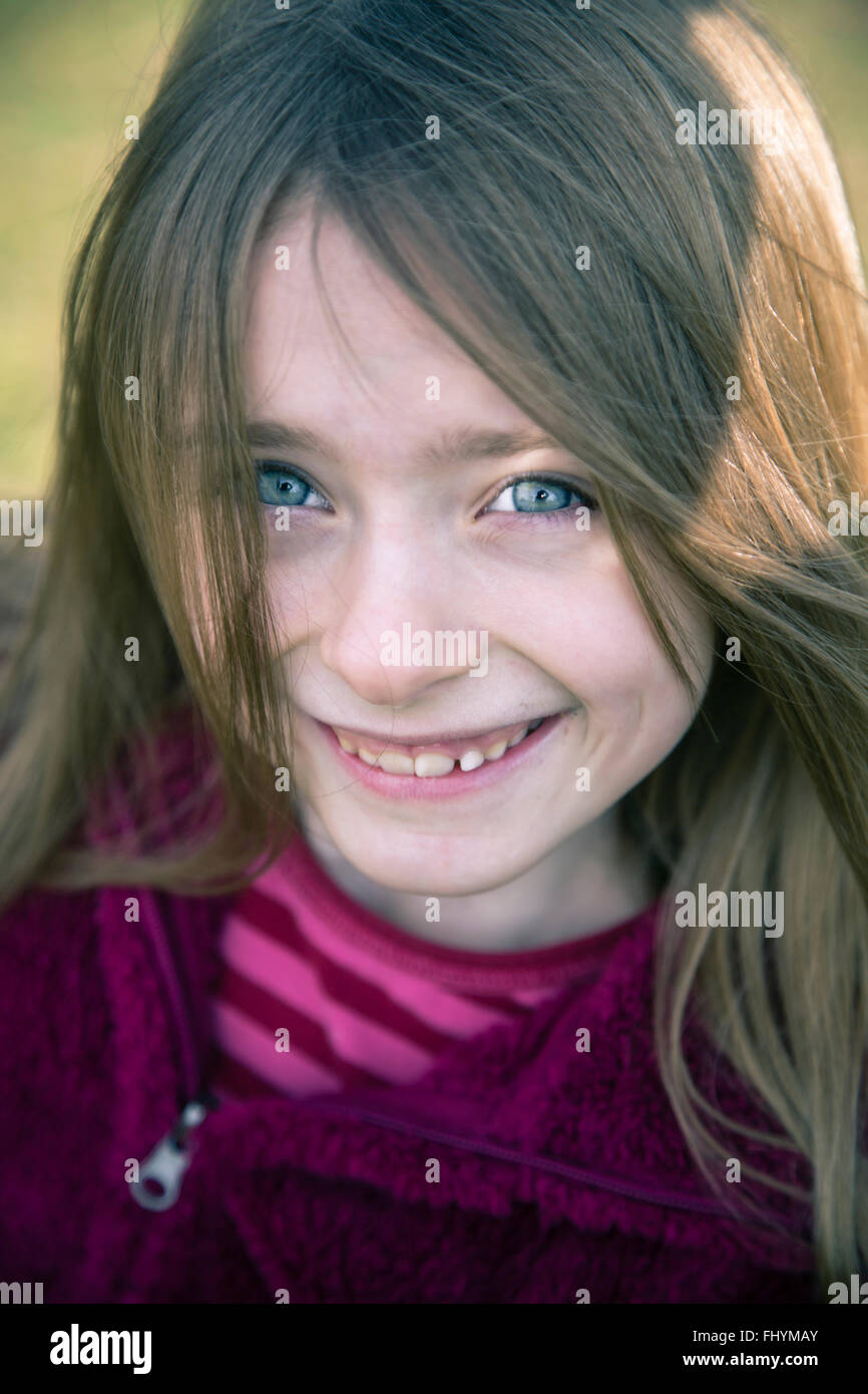 Portrait of happy girl with blue eyes Stock Photo - Alamy