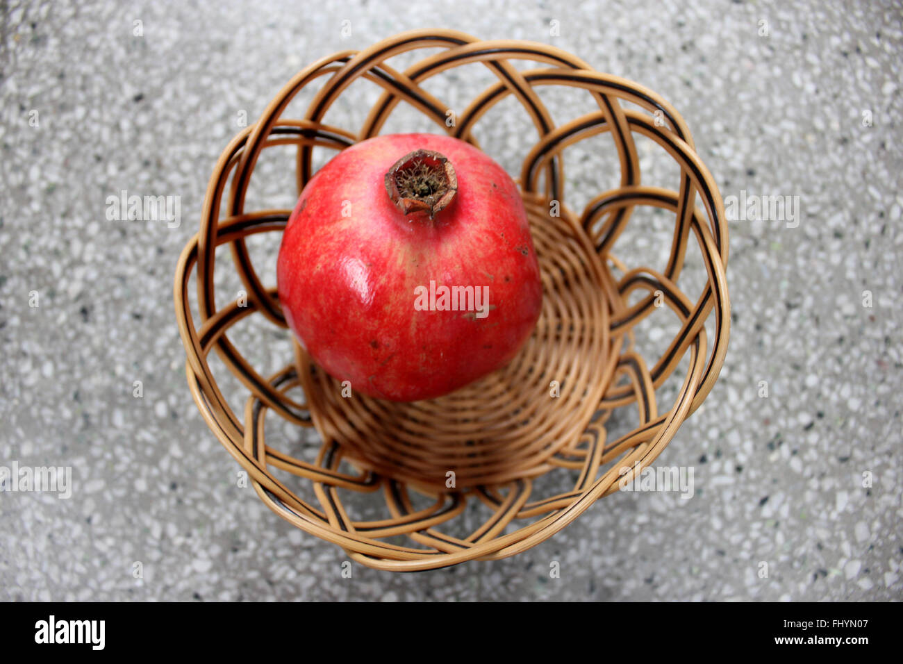 Punica granatum, Pomegranate fruit in basket , Cultivated tree, crimson ...