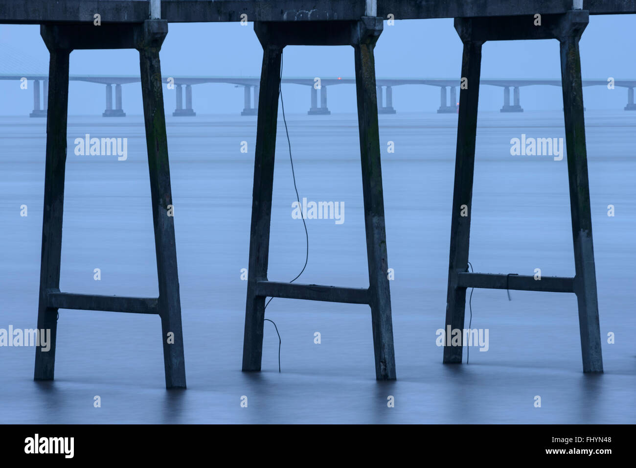 Concrete support pillars that form part of a pier at Aust, South ...