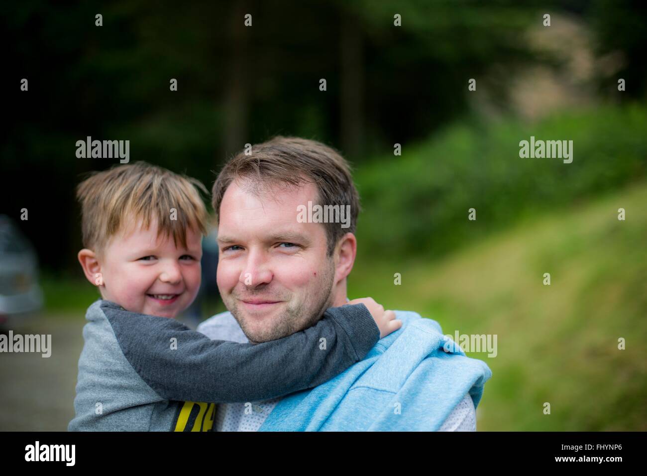 MODEL RELEASED. Father holding son, portrait Stock Photo - Alamy