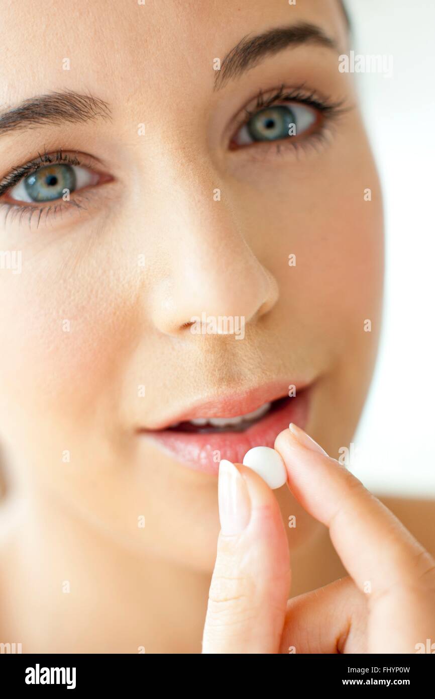 Person taking tablet hi-res stock photography and images - Alamy