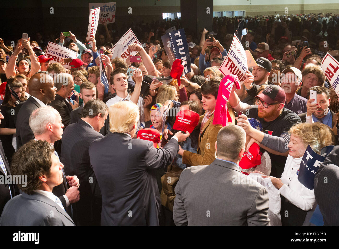 Republican presidential candidate Donald Trump greets supporters during ...