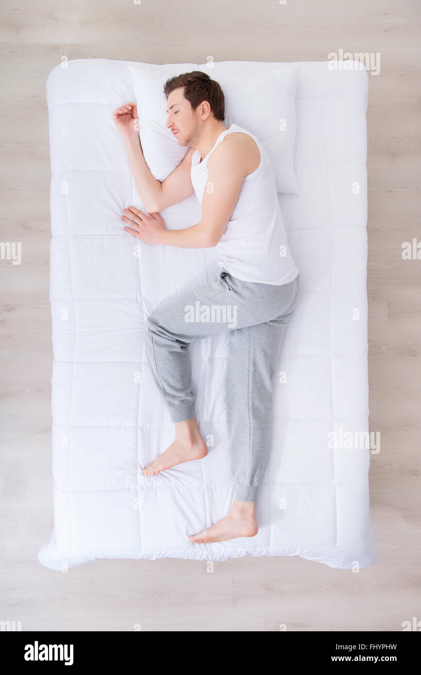 Man sleeping bed position hi-res stock photography and images - Alamy