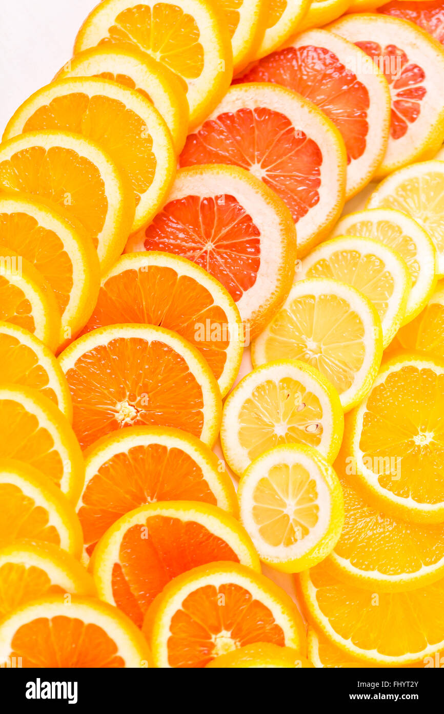 Variety of citrus fruit including lemons, lines, grapefruits and ...