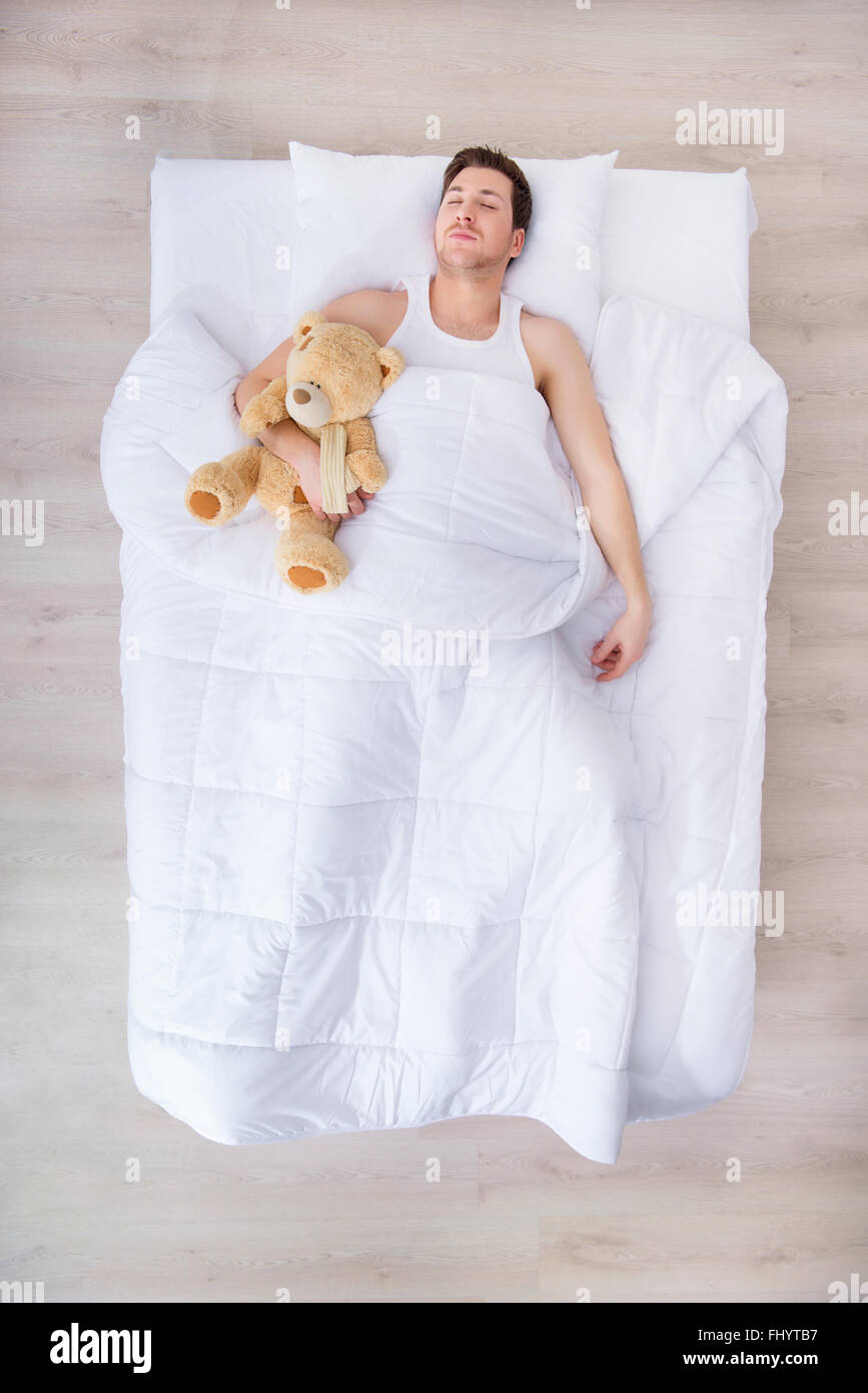 Man sleeping in the bed hi-res stock photography and images - Alamy