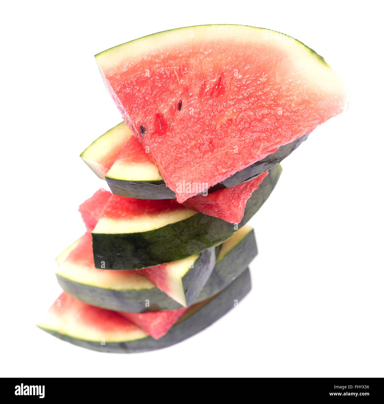stack of sliced watermelon isolated on white background Stock Photo - Alamy