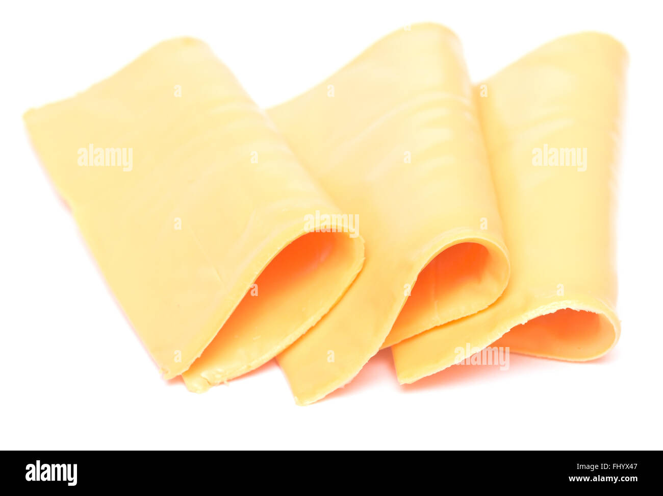 cheese slices isolated on white background Stock Photo - Alamy