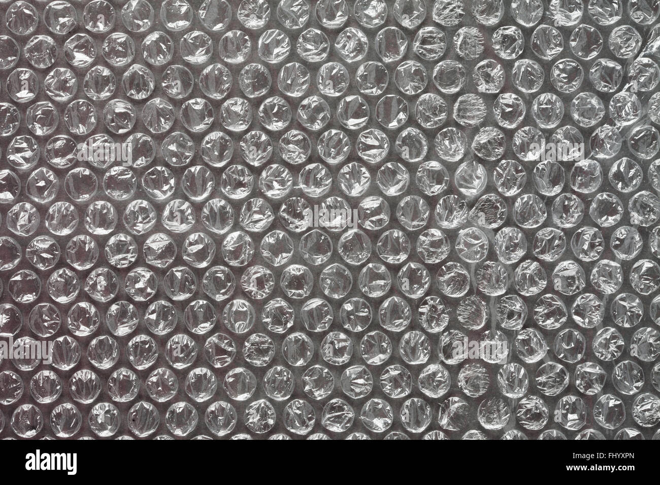Bubble wrap texture on grey, texture Stock Photo - Alamy