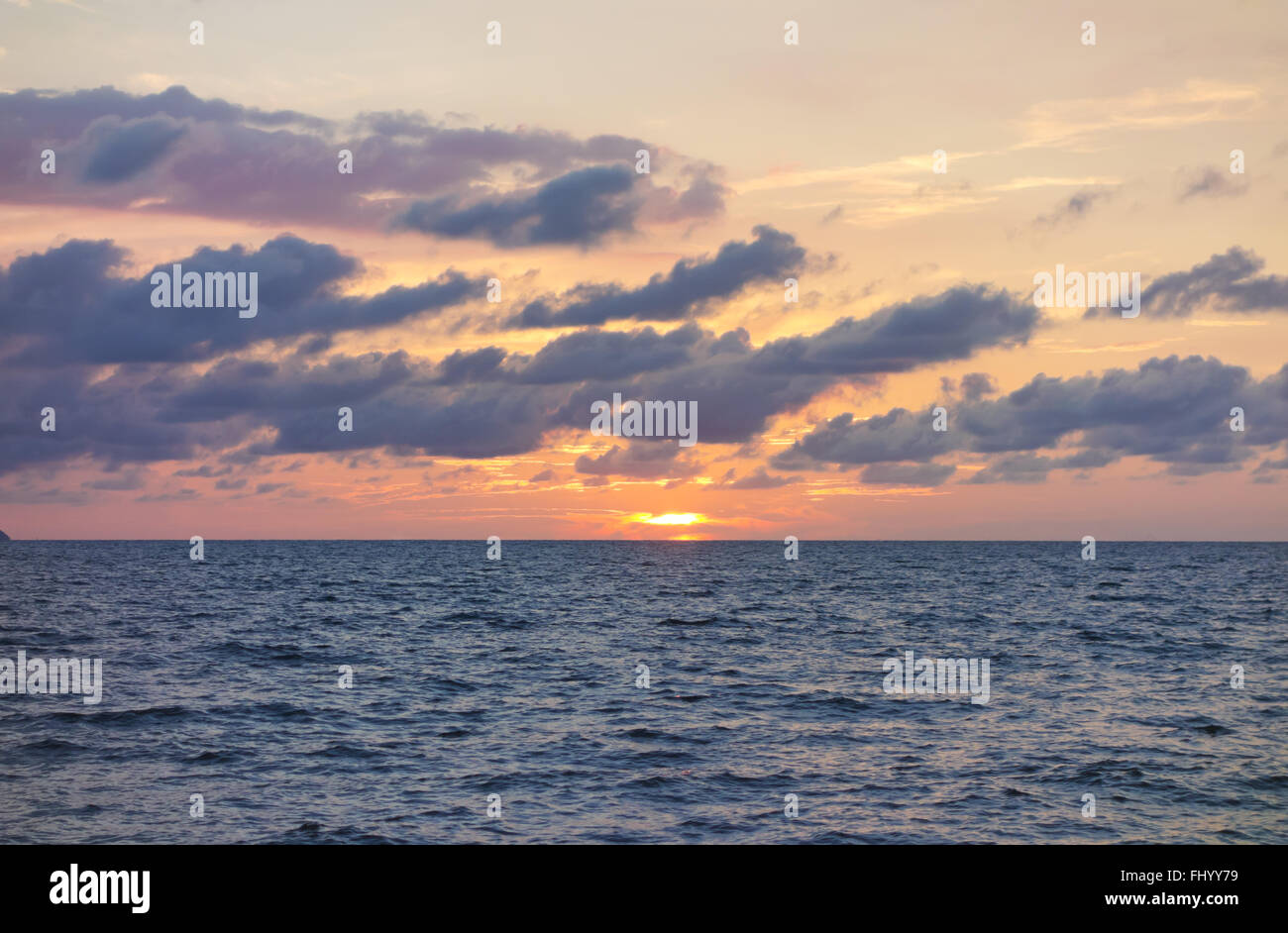 image of sunset over sea Stock Photo - Alamy