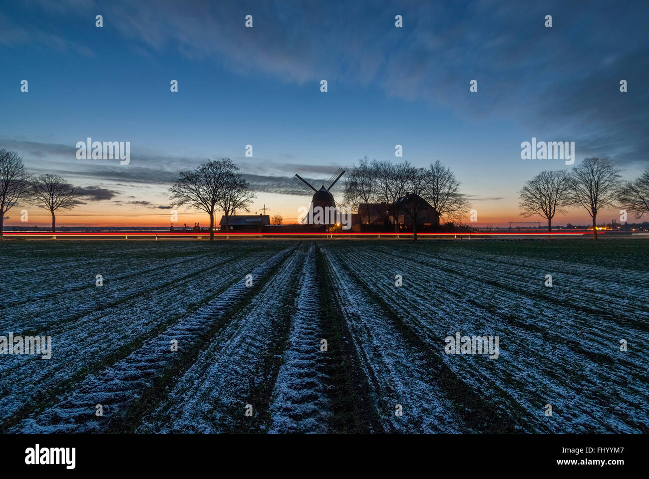 Germany, Gifhorn, Meine, wind mill in winter, field with snow Stock ...
