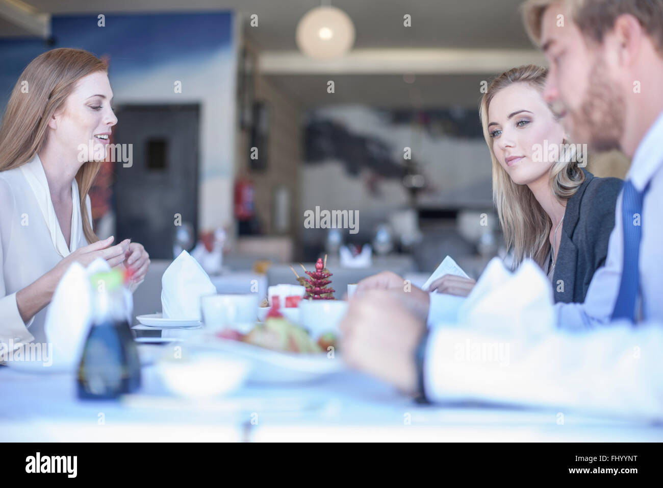 Business people having lunch at restaurant Stock Photo - Alamy