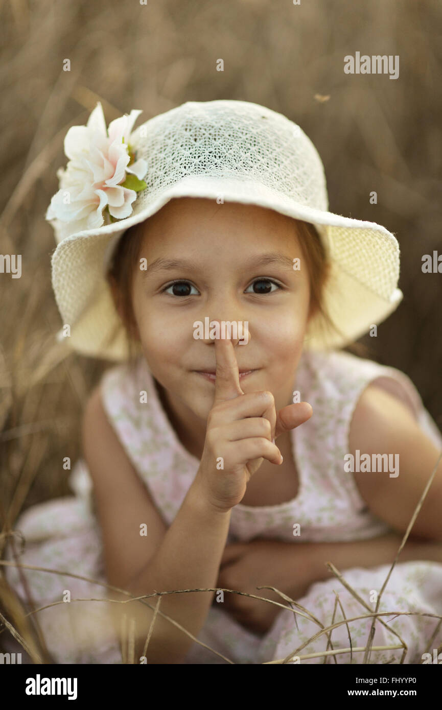 Cute little standing girl Stock Photo - Alamy
