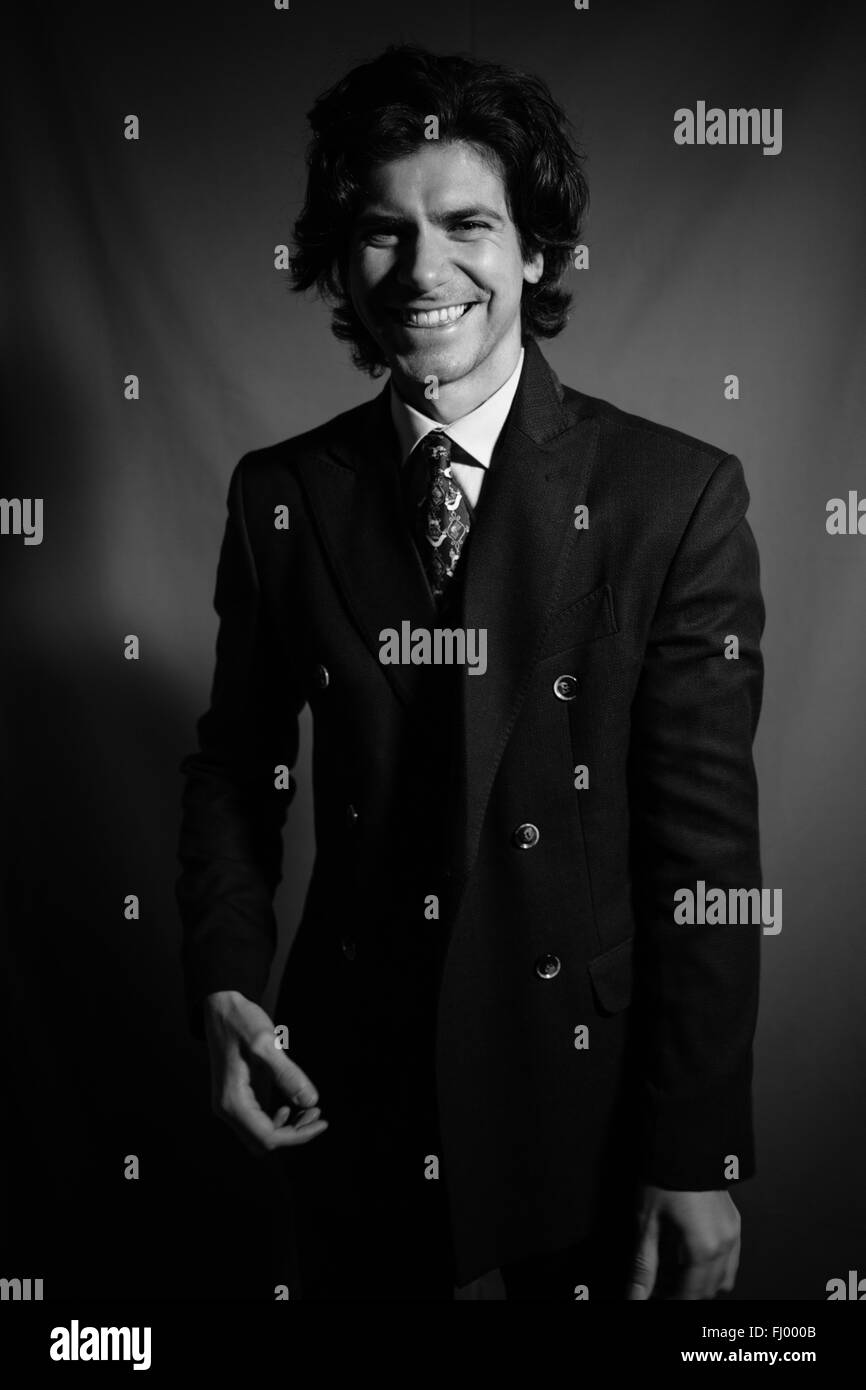 Smiling man work in Black and White Stock Photos & Images - Alamy