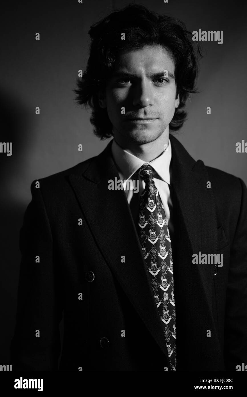 Young businessman over white Black and White Stock Photos & Images - Alamy