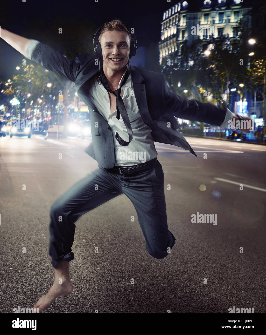 Smiling relaxed guy dancing in a downtown Stock Photo - Alamy