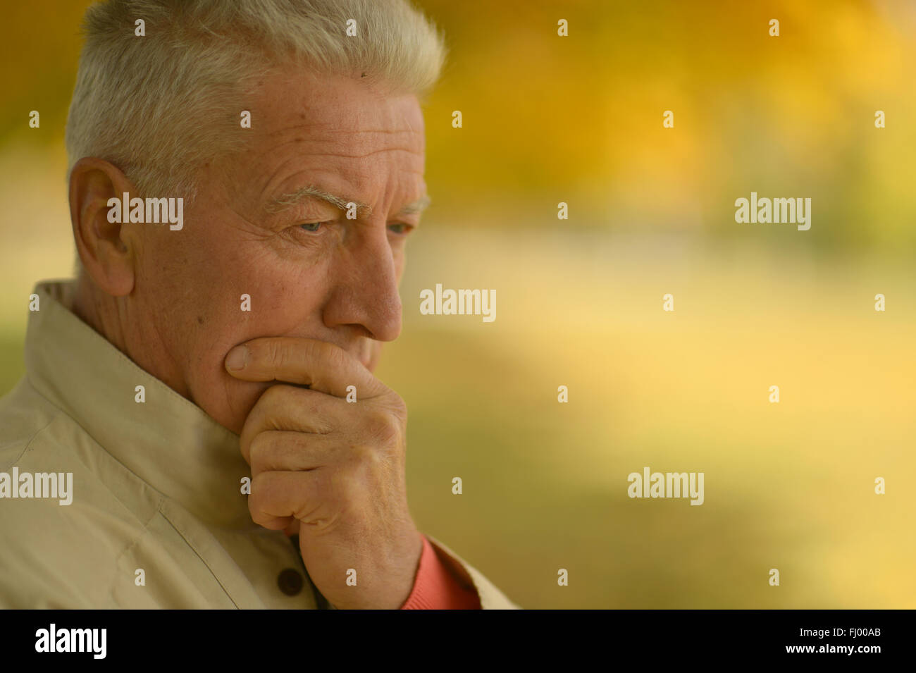 Senior man thinking Stock Photo - Alamy