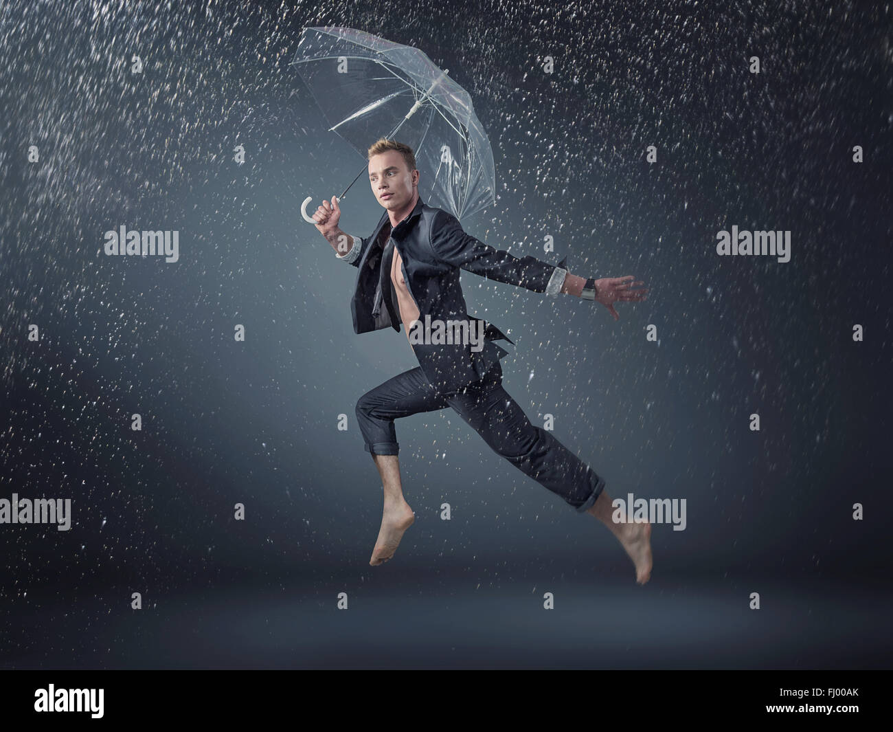 Dancing rain umbrella hi-res stock photography and images - Alamy