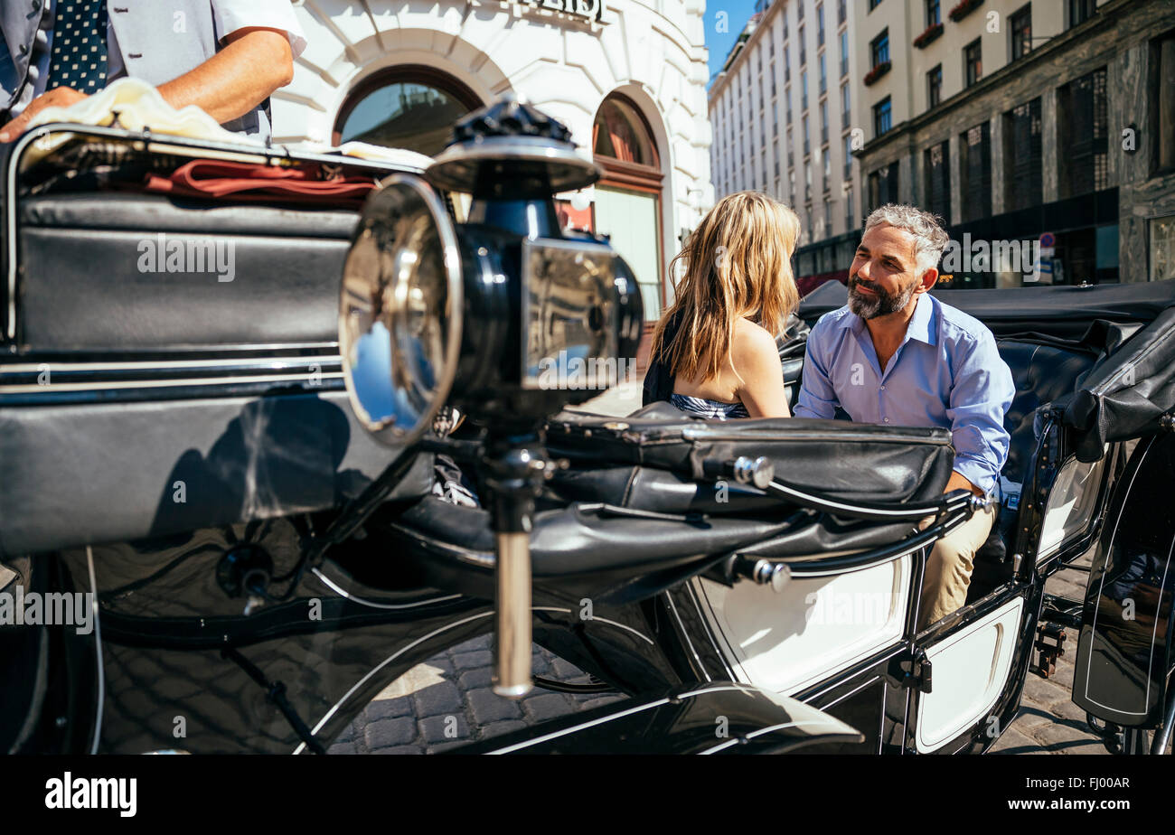 Austria, Vienna, couple in love sitting face to face in a fiaker Stock ...