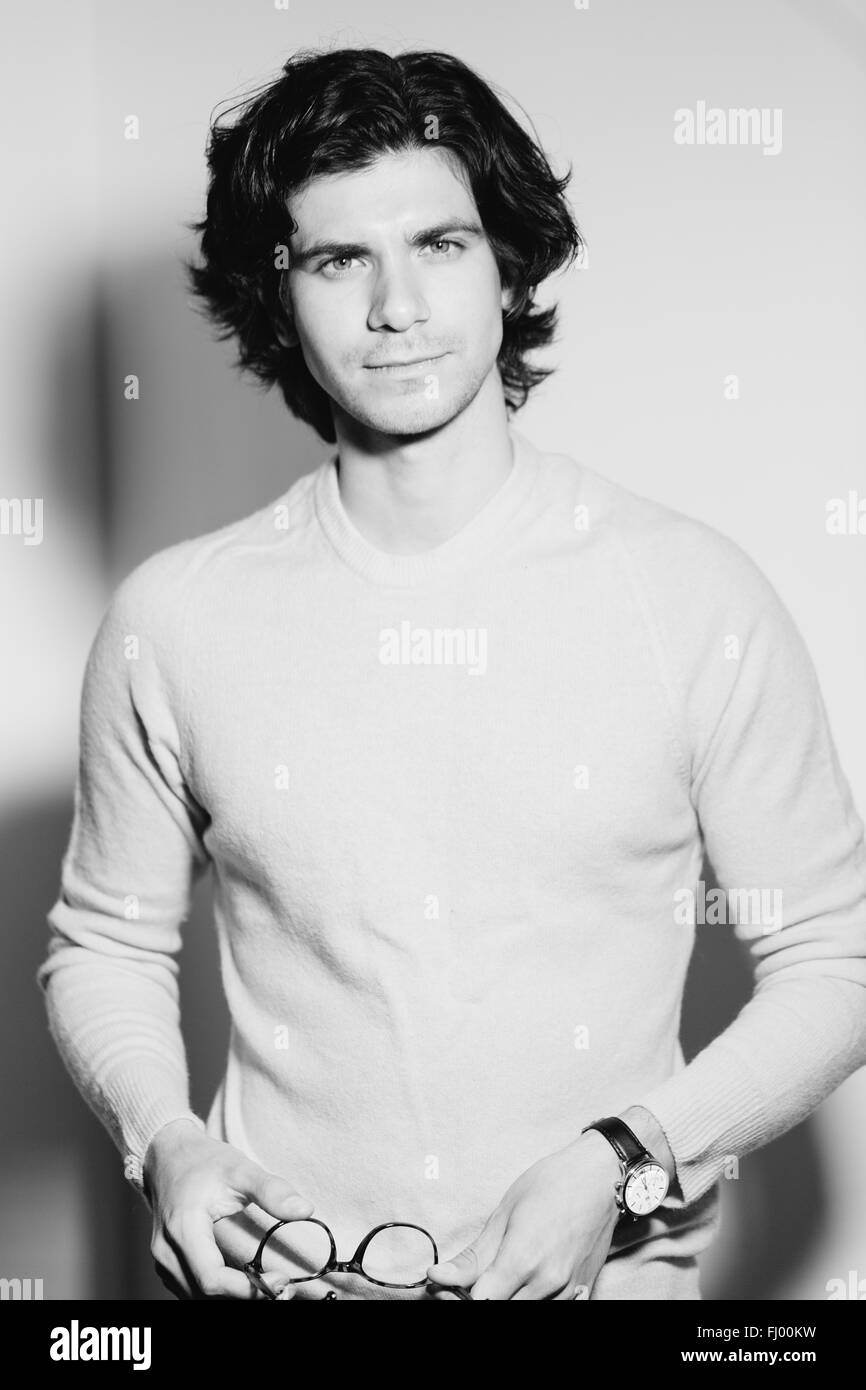 Man holding photo Black and White Stock Photos & Images - Alamy