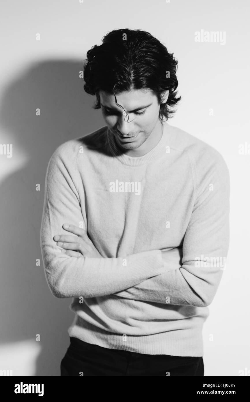 Young person arms folded Black and White Stock Photos & Images - Alamy